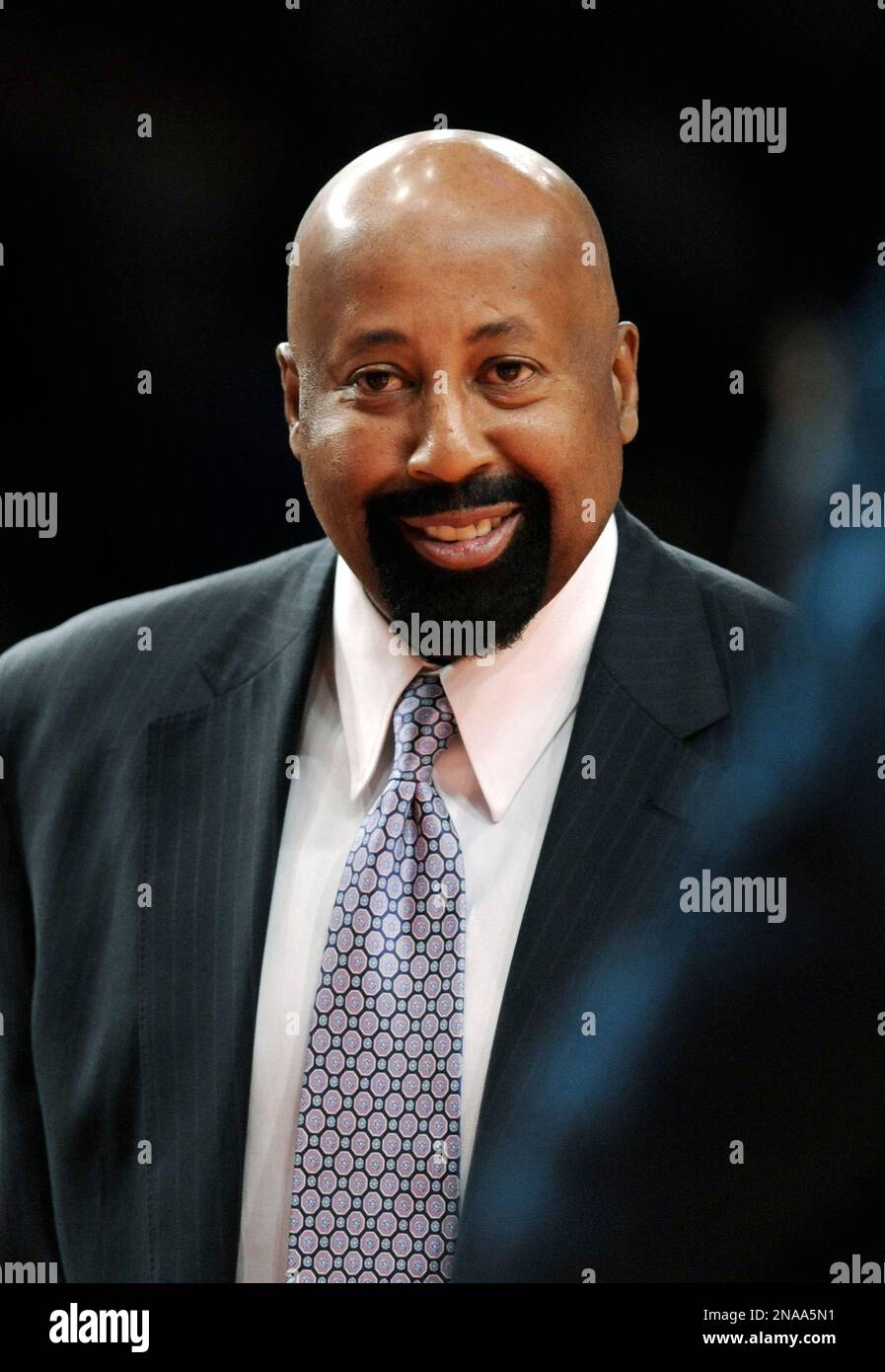 New York Knicks assistant coach Mike Woodson looks on during the fourth ...