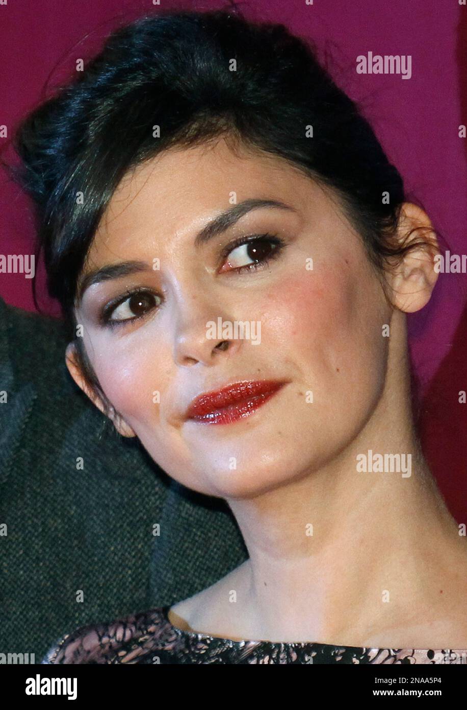 French actress Audrey Tautou poses for photographers as she arrives for ...