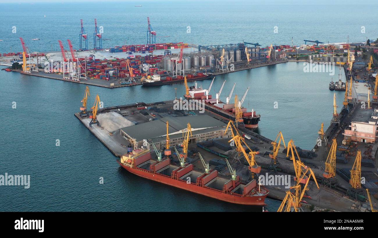 Aerial view of sea port with tower cranes and containers. Warehouse and ...