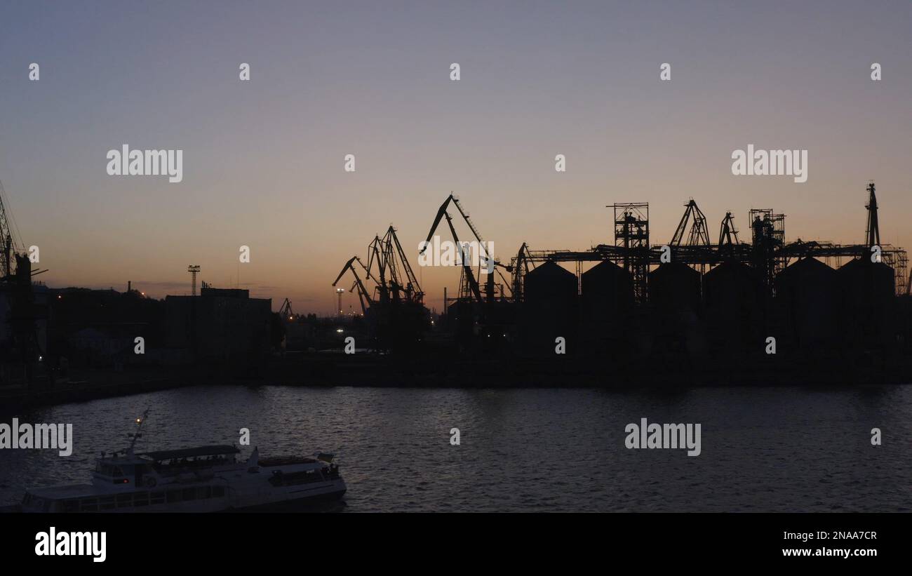 Scape of sea port and ship with no electrical power at night. Blackout ...