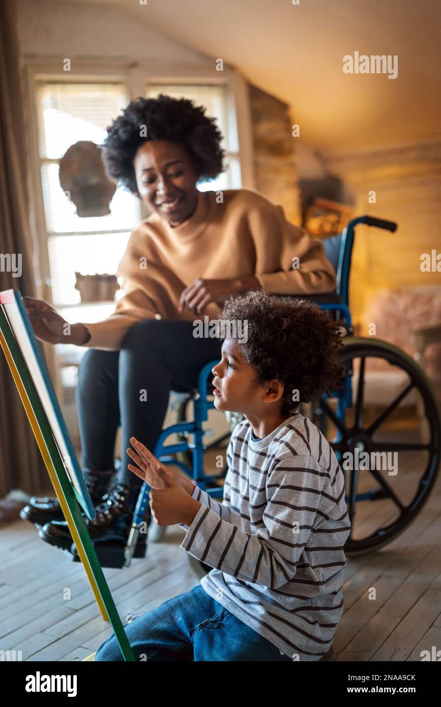 Parent teacher student wheelchair hi-res stock photography and images ...