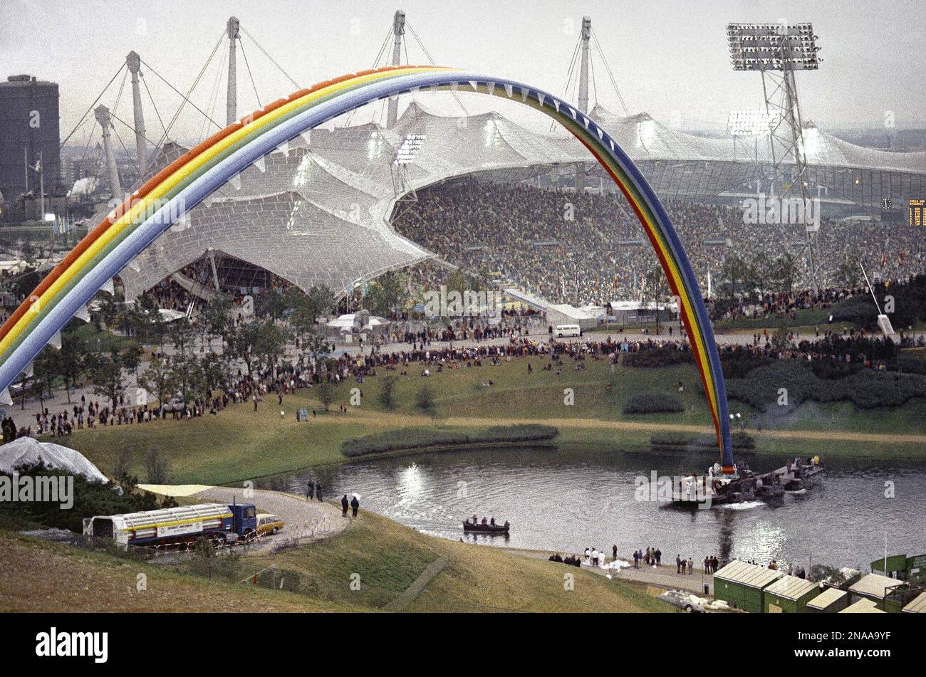 A rainbow in the five Olympic colors is displayed during the closing ...