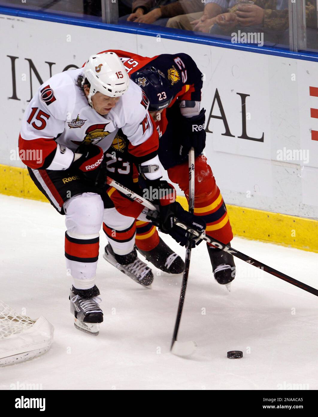 Florida Panthers' Tyson Strachan (23) battles Ottawa Senators' Zack ...
