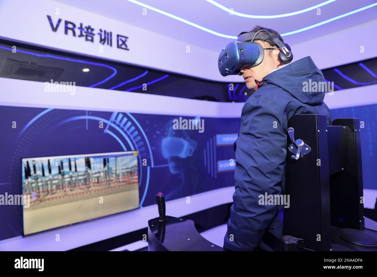 NANJING, CHINA - FEBRUARY 13, 2023 - Electric workers experience in VR ...