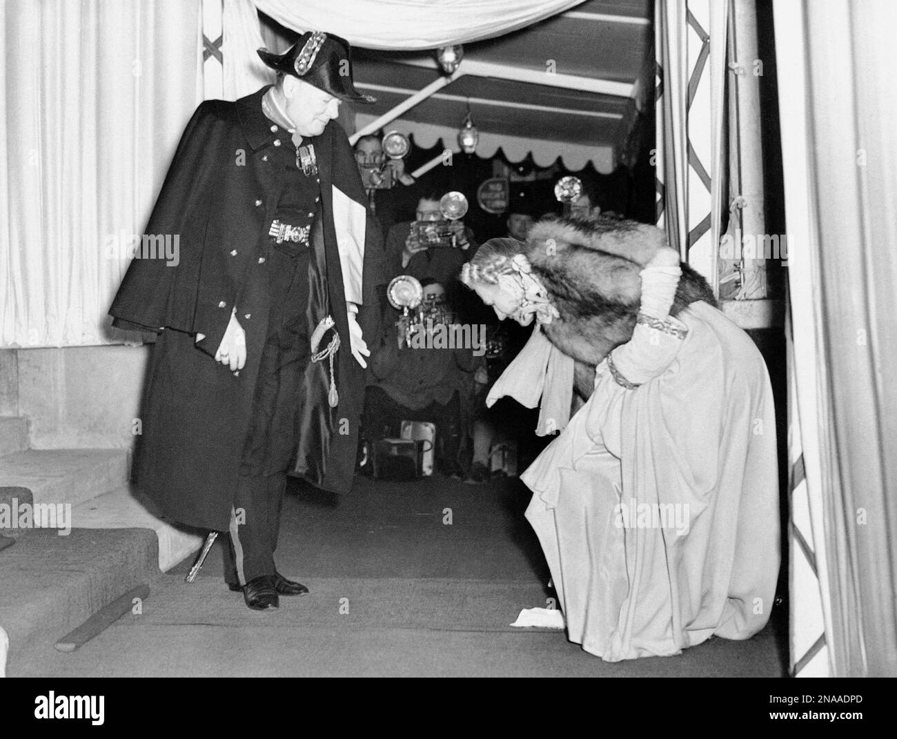 Mrs. Clementine Churchill retrieving a handkerchief for her husband Sir ...