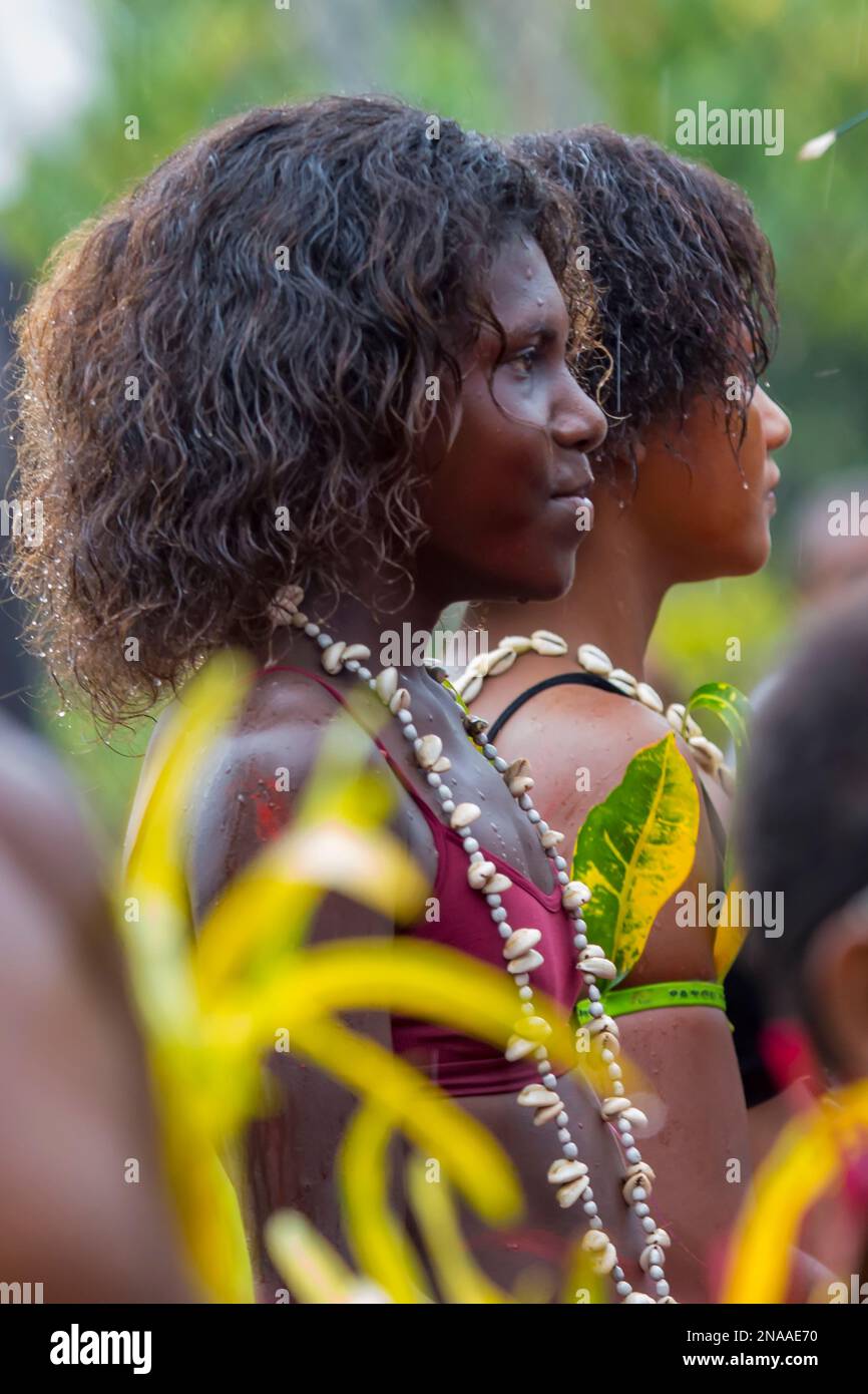 Village women preparing to perform traditional sing sing Melanesian ...