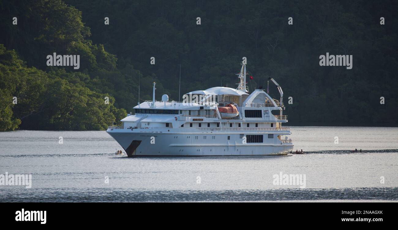 Expedition cruise ship in Tufi Fjord on the Cape Nelson peninsula, Oro ...