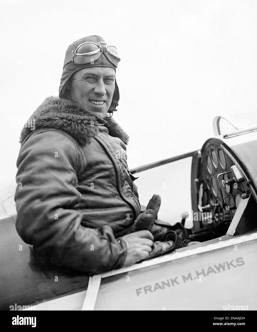 Aviator Captain Frank Monroe Hawks in the cockpit of his monoplane at ...