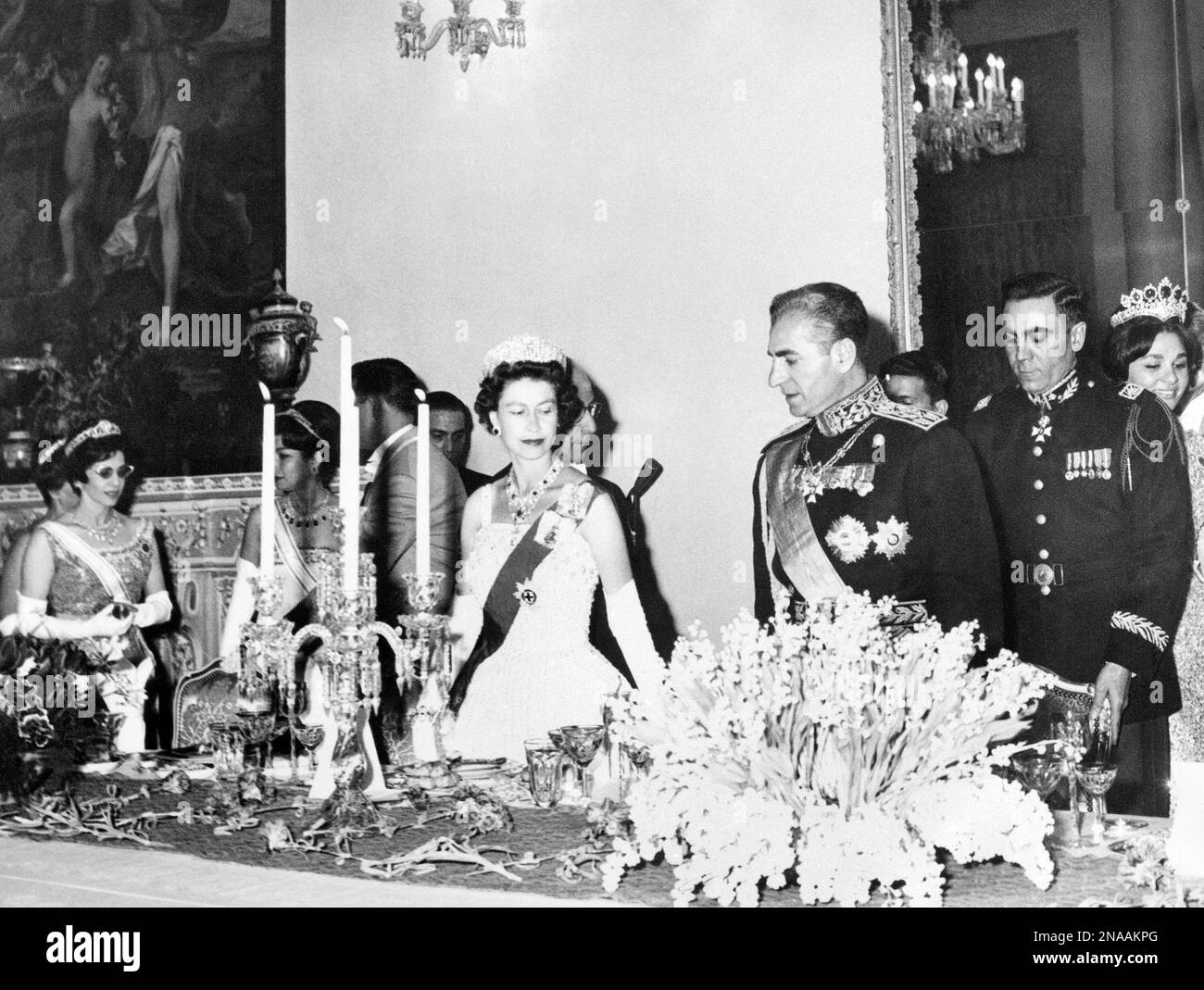 Britain's Queen Elizabeth II and the Shah Mohammed Reza Pahlevi of Iran ...