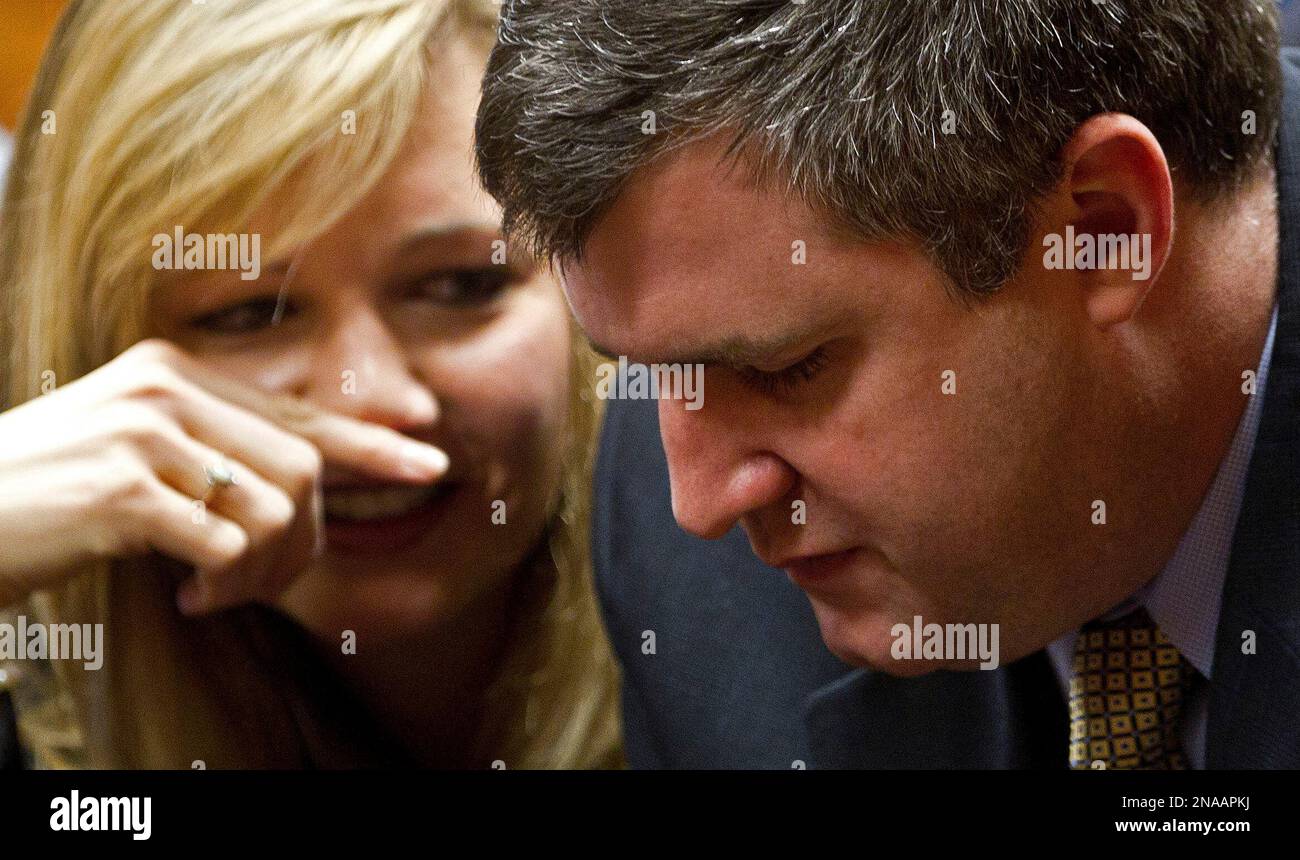 Gabe Watson talks with his wife, Kim, after arriving at the Jefferson ...