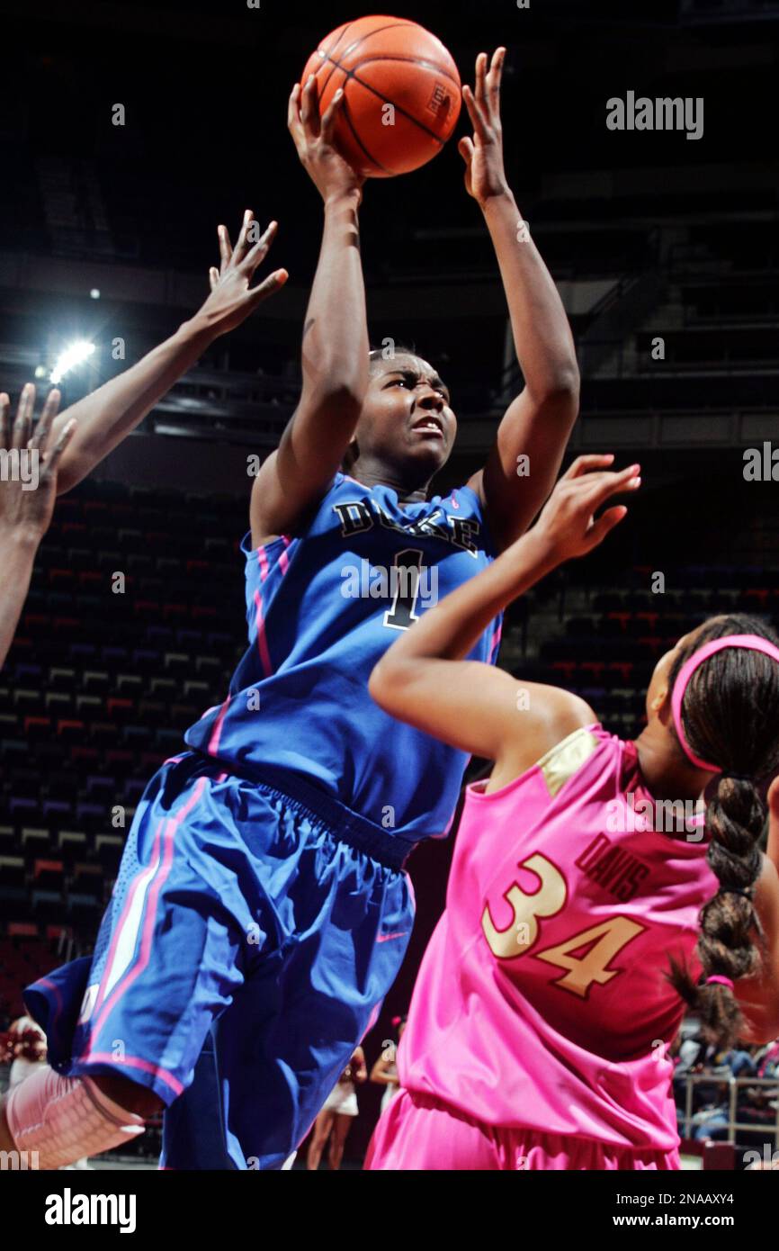 Duke's Elizabeth Williams (1) shoots on Florida State's Chelsea Davis ...