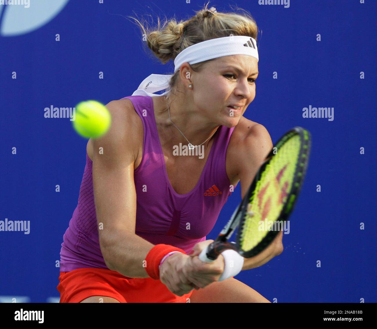 Maria Kirilenko of Russia returns a shot against Daniela Hantuchova of ...