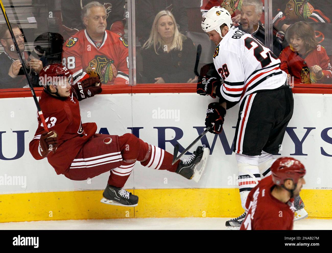 Chicago Blackhawks' Bryan Bickell (29) checks Phoenix Coyotes' Oliver ...