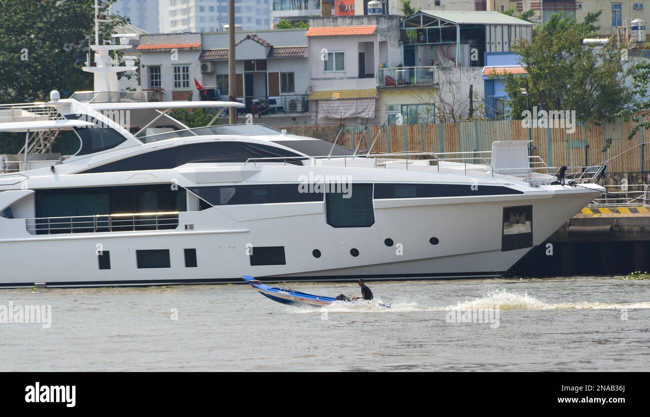 Saigon, Vietnam - Feb 11, 2023. Yacht boat docking on Saigon River ...