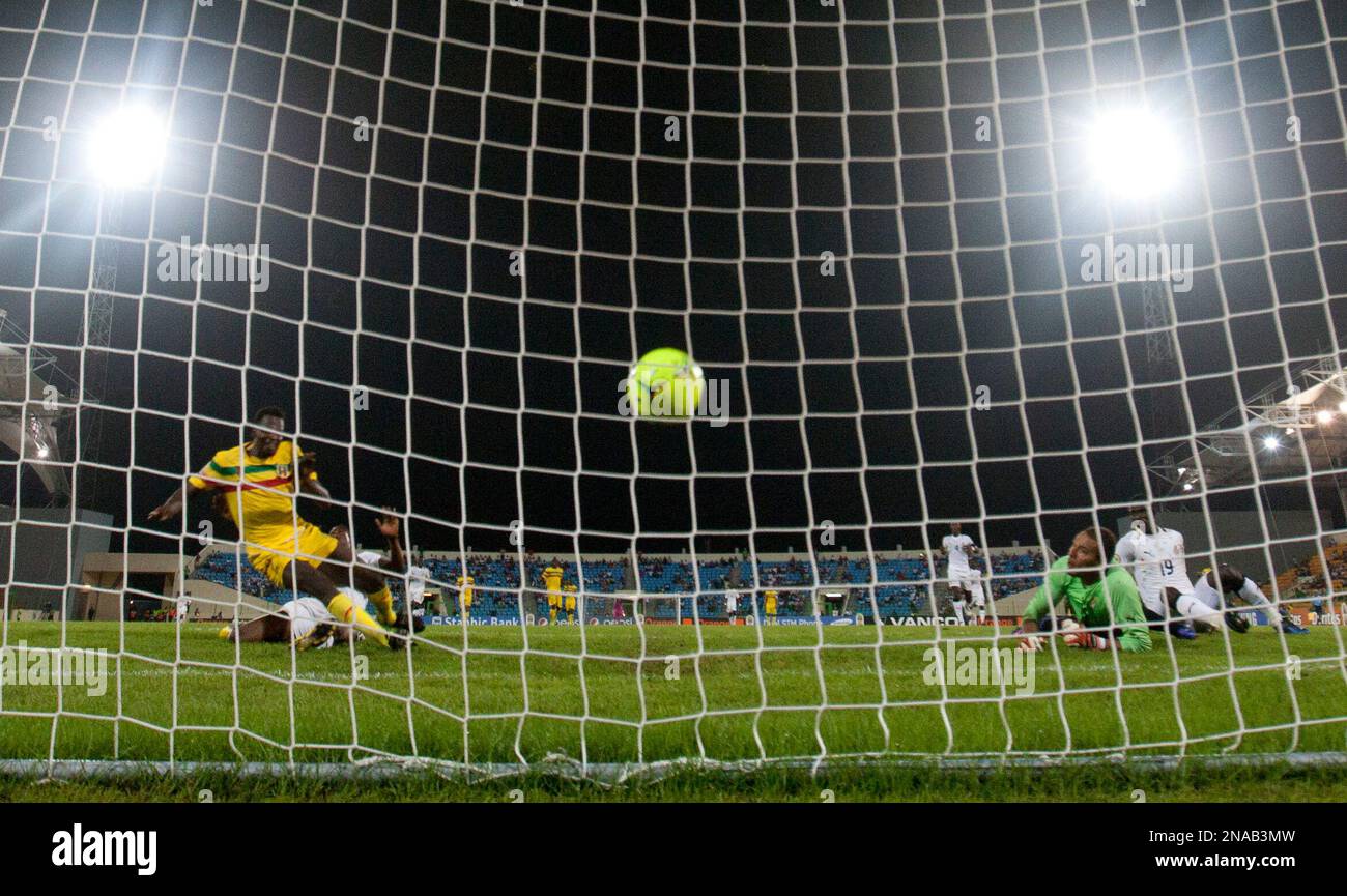 Mali's Cheick Tidiane Diabate, left, scores his second goal as Ghana's ...