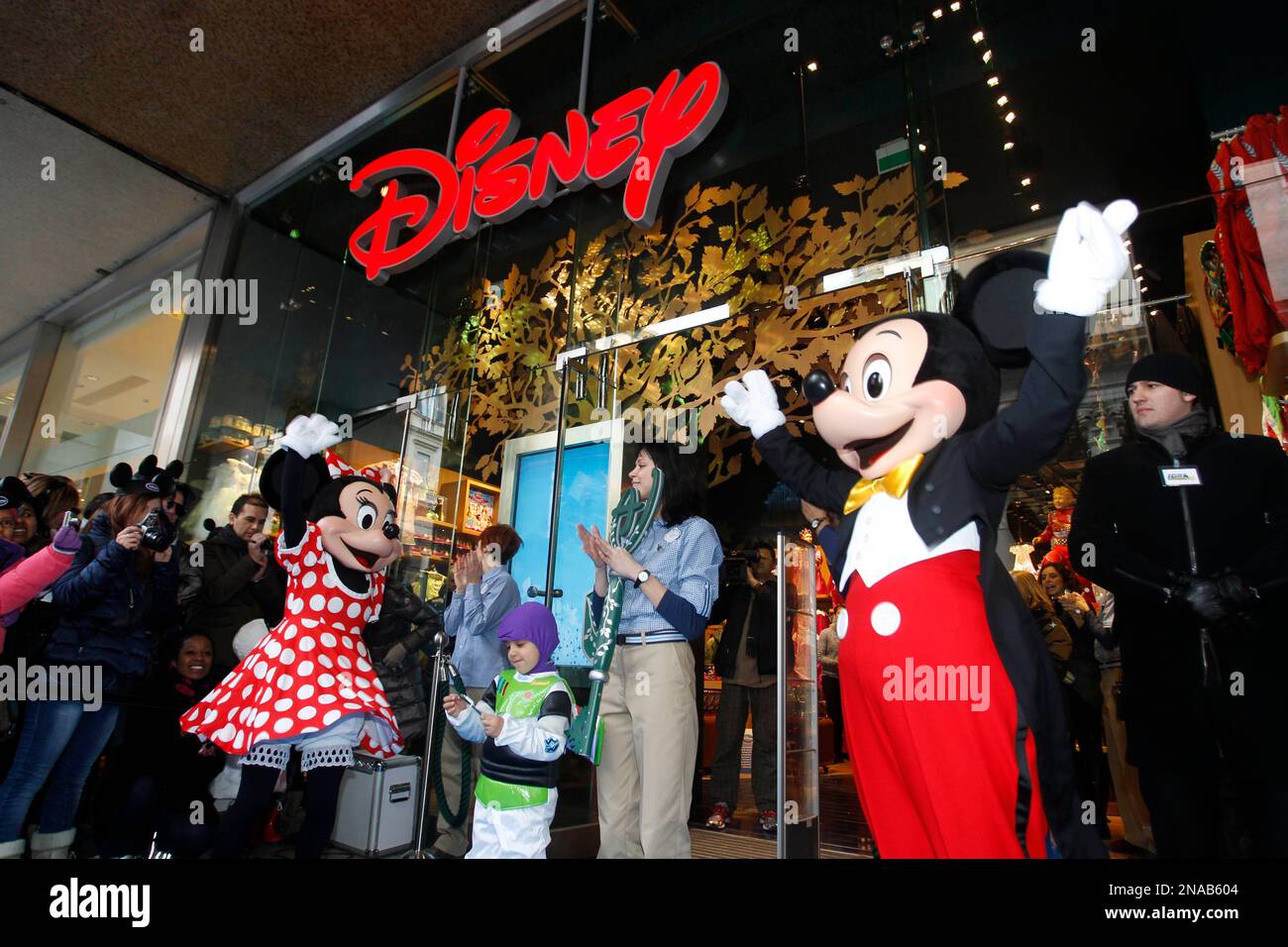Micky Mouse and Minnie muppets are seen during a Disney store unveiling ...