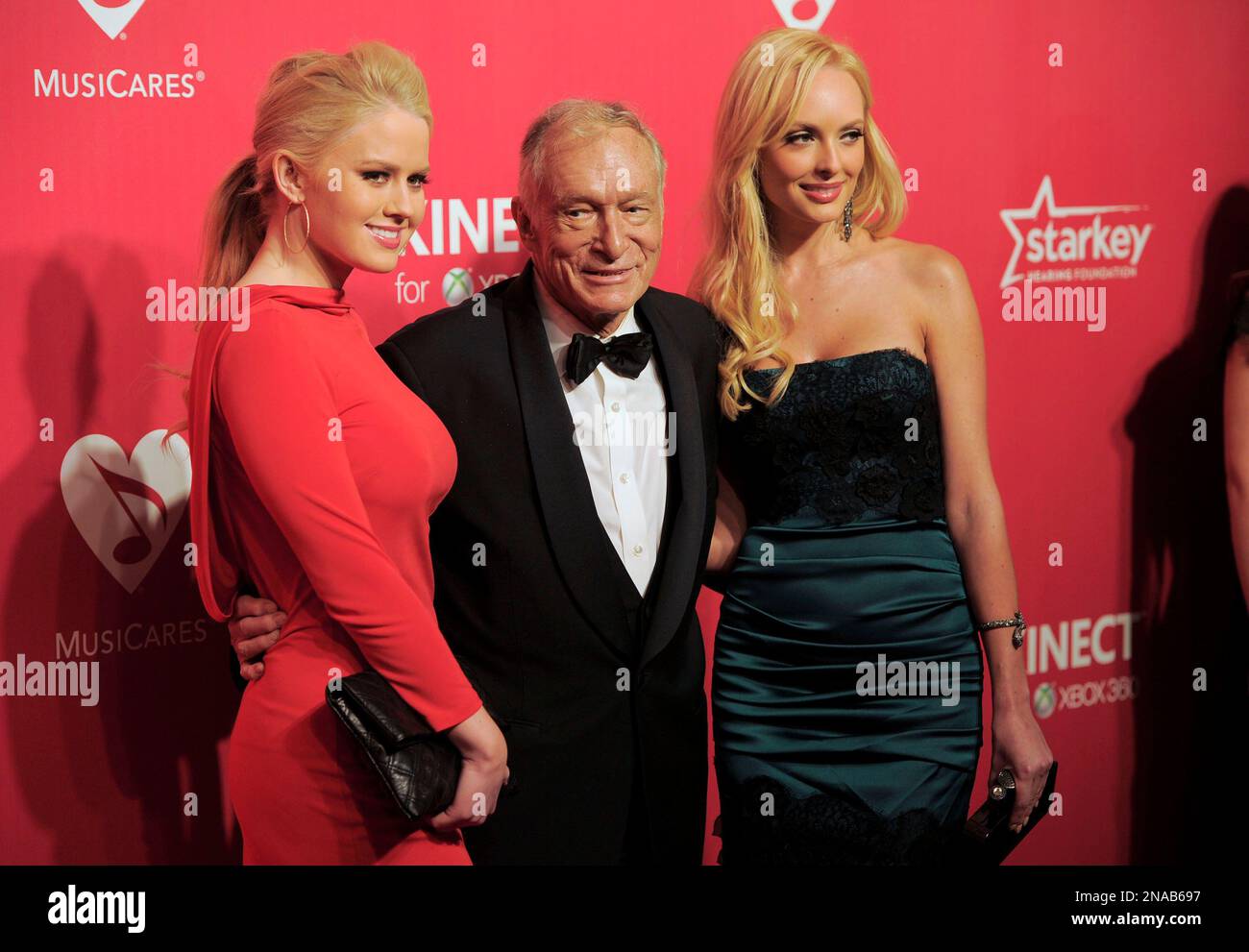 Hugh Hefner, center, Anna Sophia Berglund, left, and Shera Bechard ...