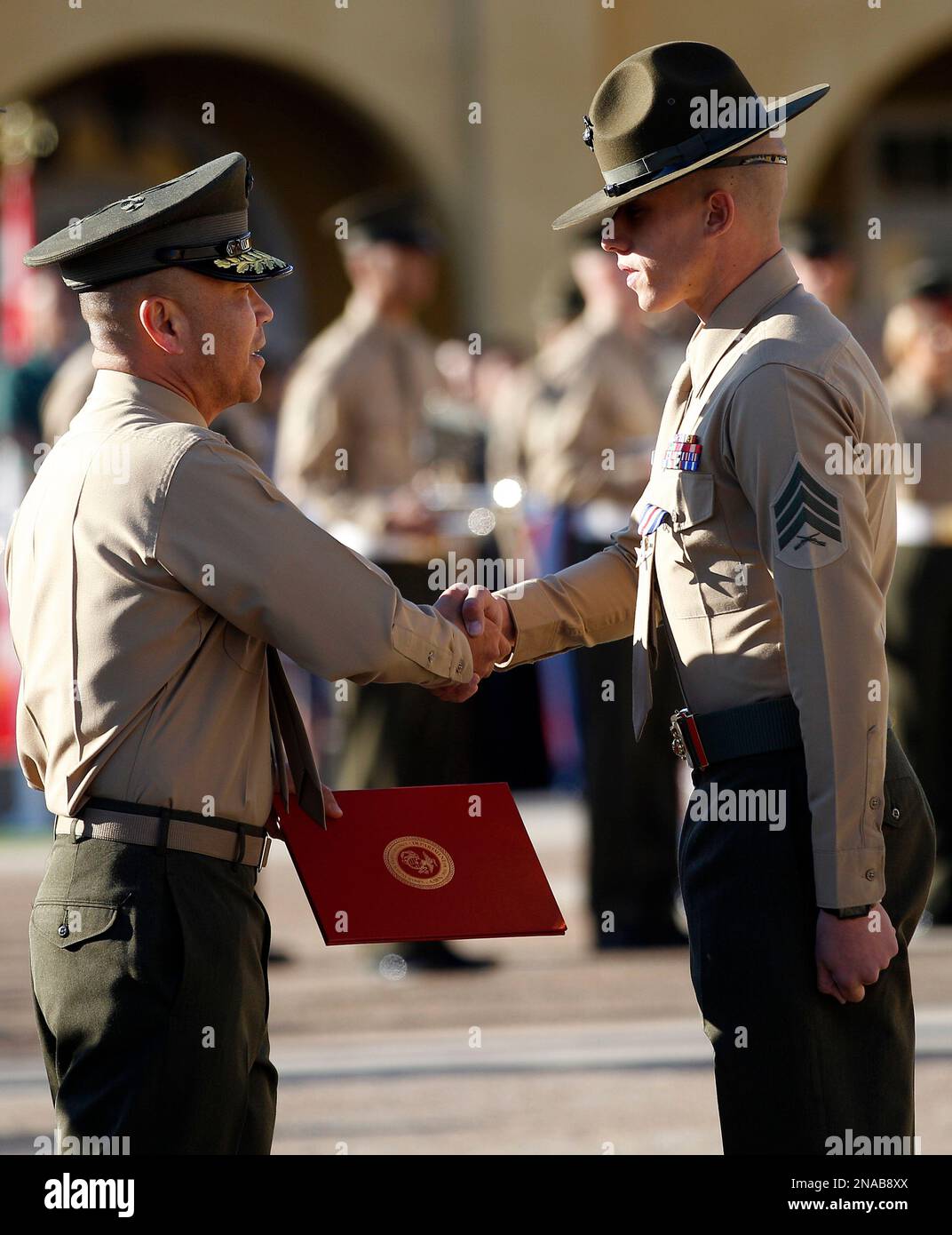 United States Marine Sgt. Philip A. McCulloch Jr., right, is ...
