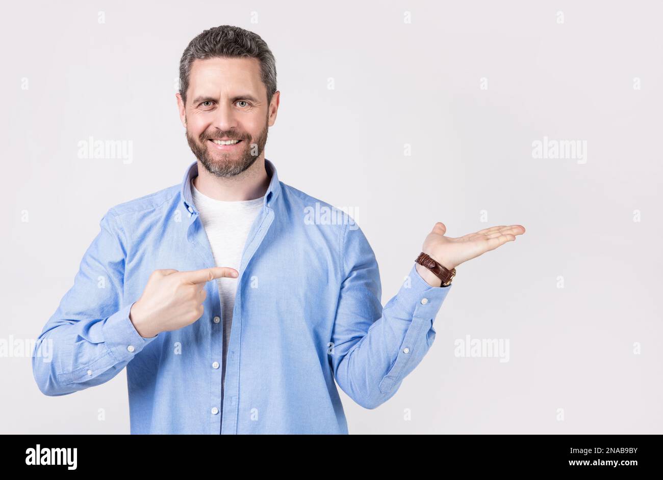 smiling man pointing and offer advertisement. man pointing and offer ...