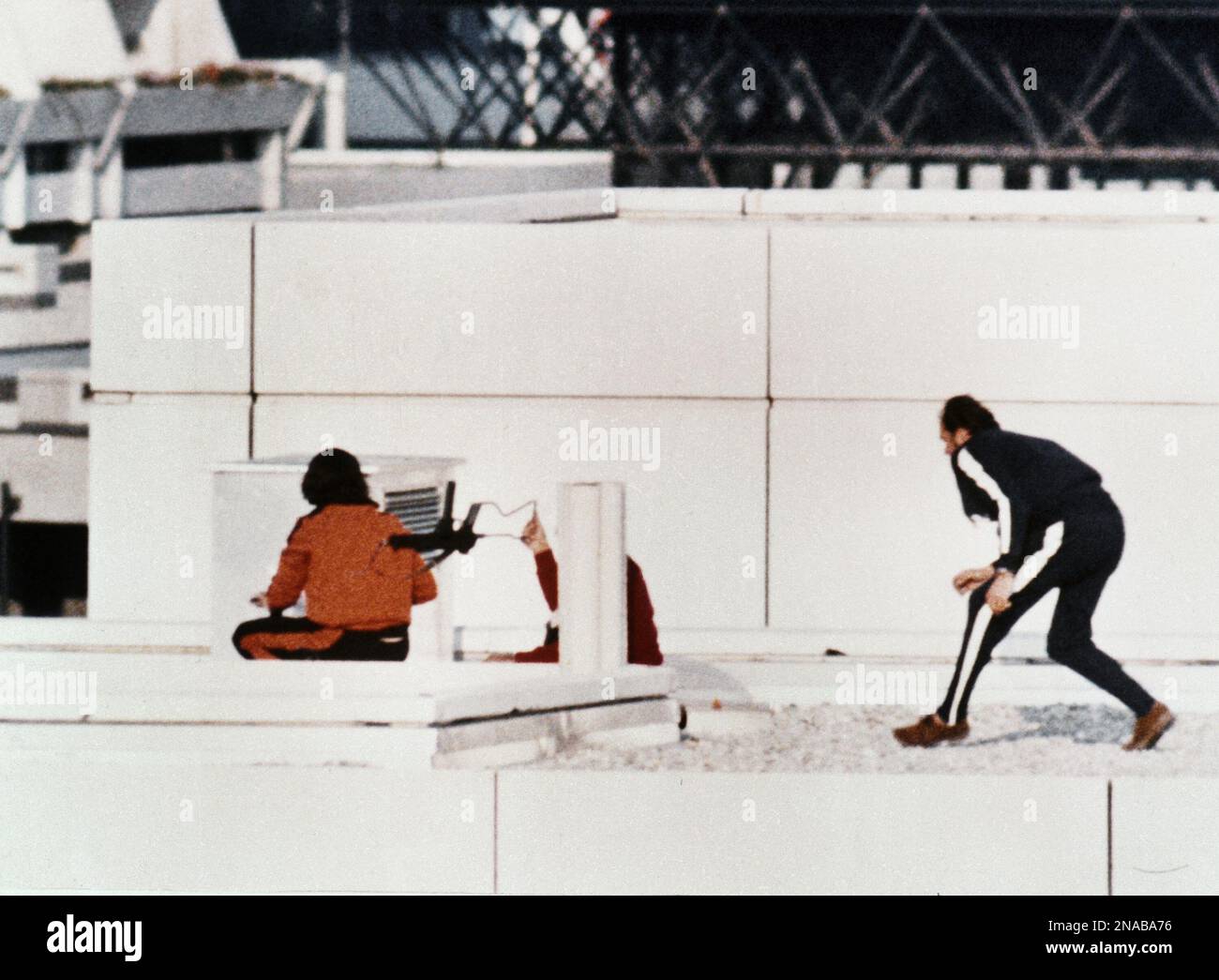 West German policemen wearing athletics sweatsuits, bullet-proof vests ...