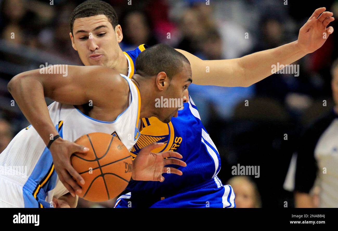 Denver Nuggets guard Arron Afflalo, front, drives past Golden State ...