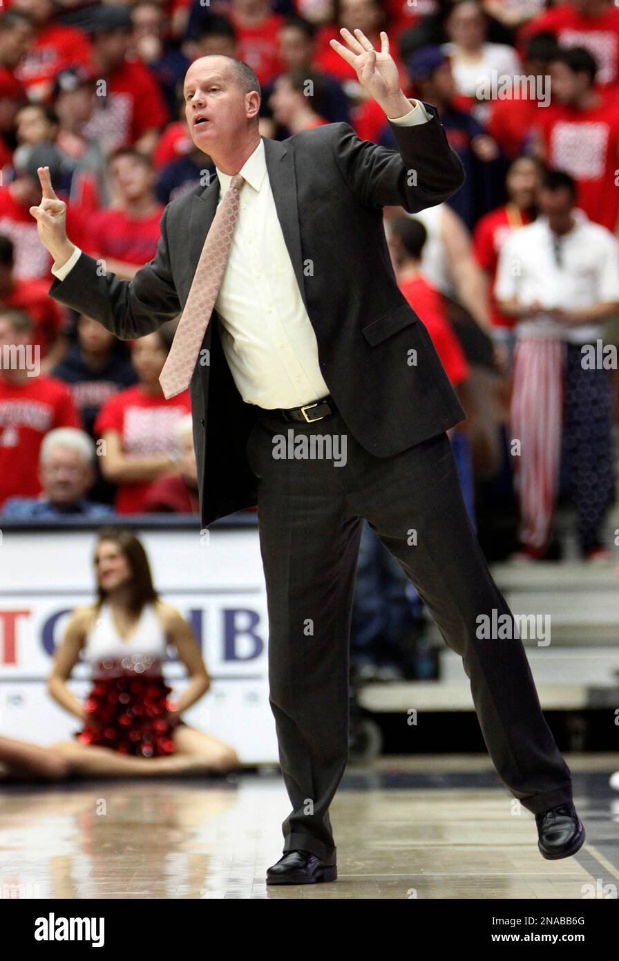 Colorado coach Tad Boyle tries to signal in a play against Arizona ...