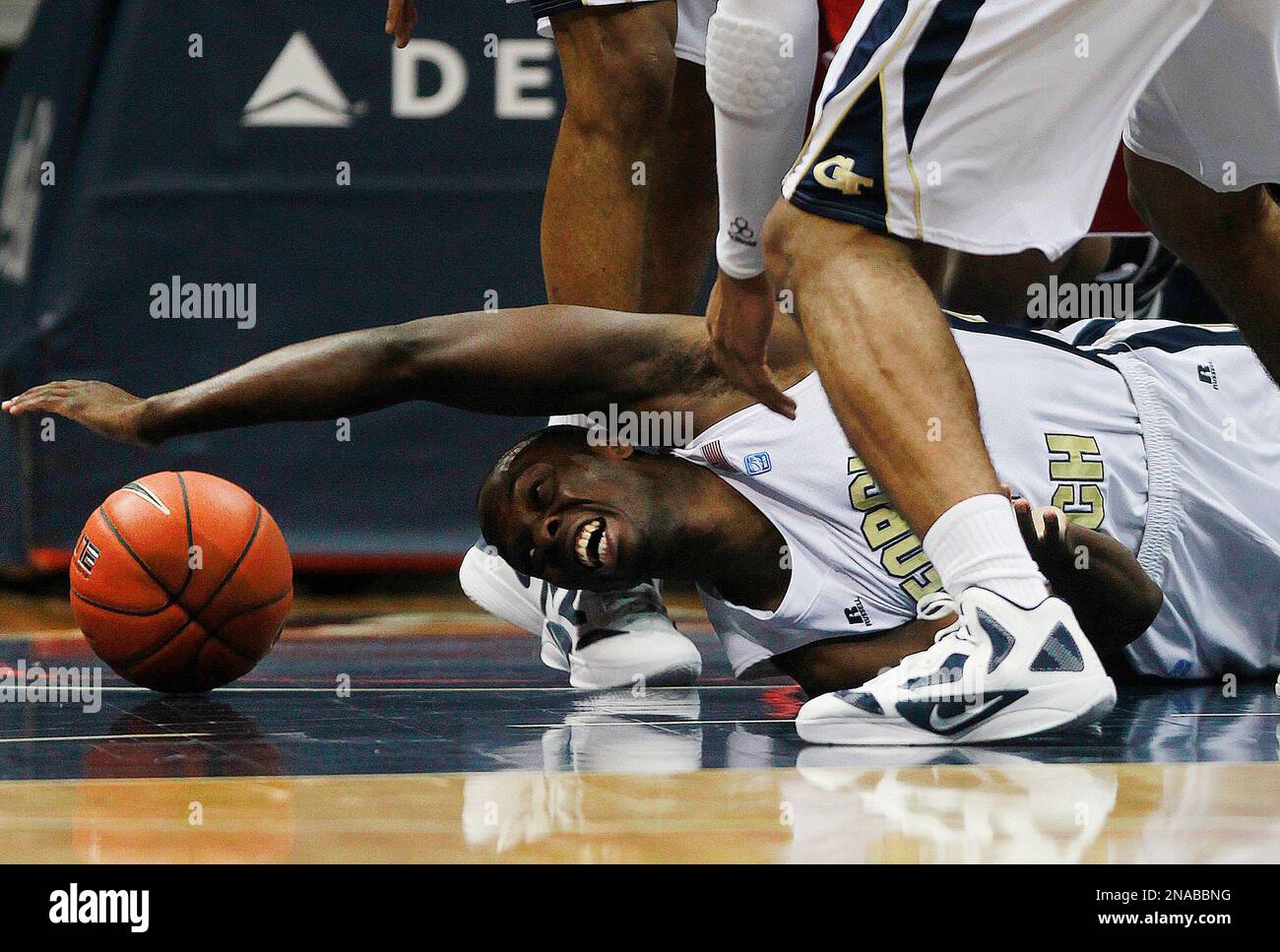 Georgia Tech guard Mfon Udofia (0) reaches for a loose ball during the ...