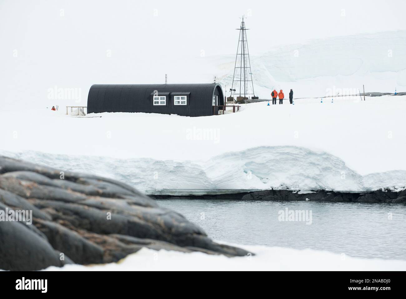 Visitors to the British Port Lockroy base, now a museum and post office ...