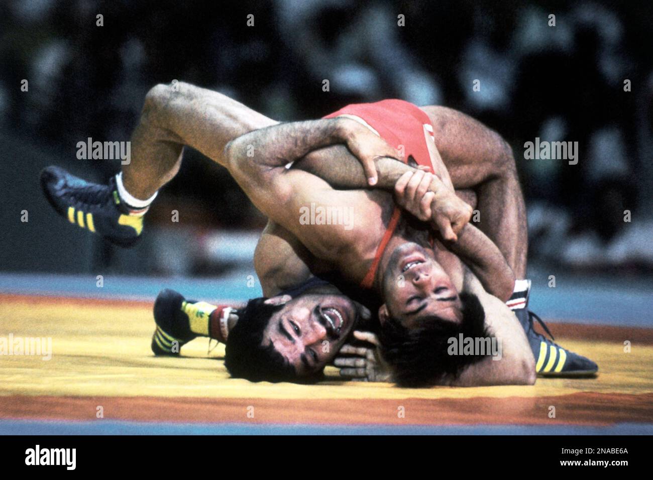 Vlado Lisjak of Yugoslavia, in red, defeats Sumer Kocak during the Men ...