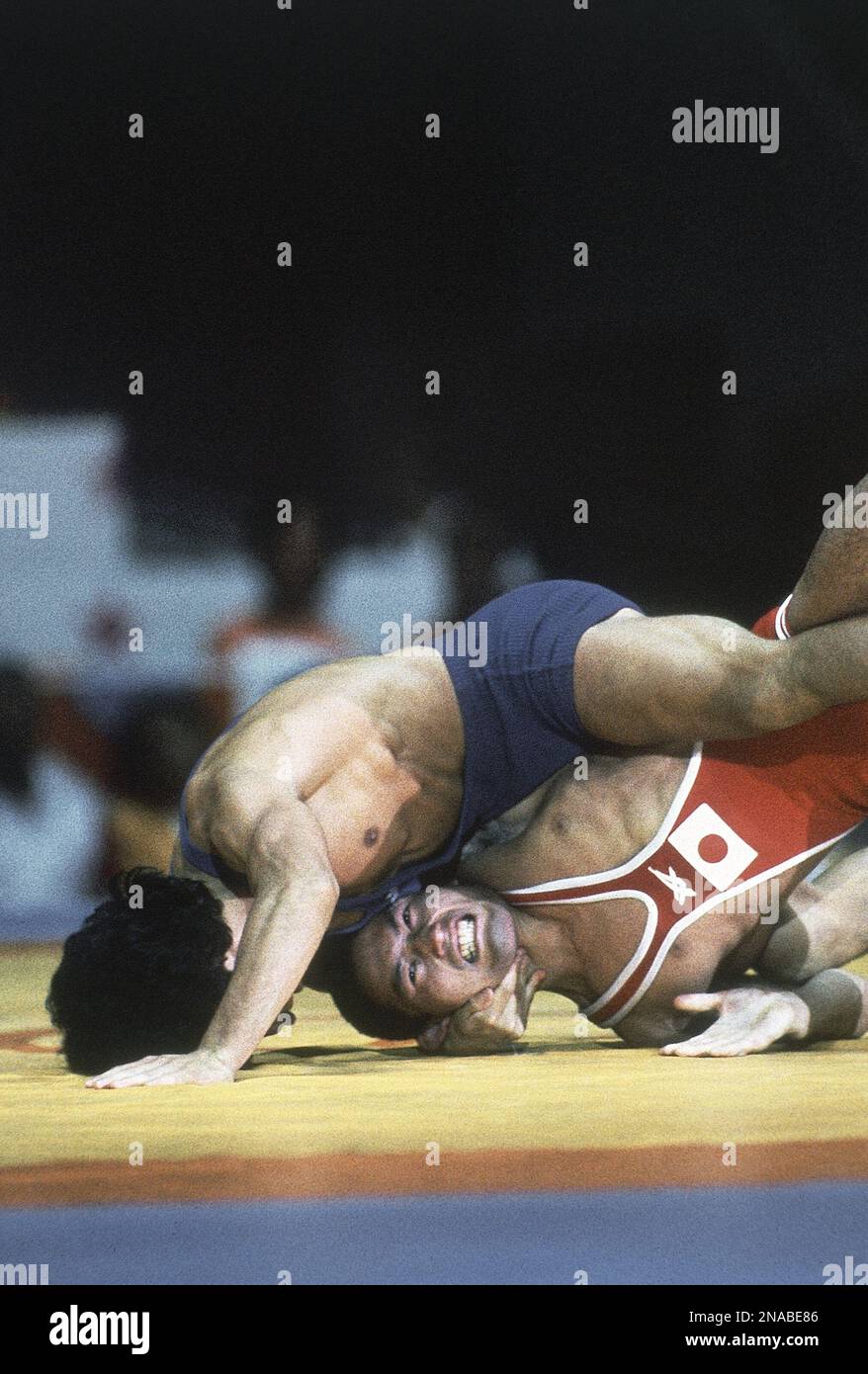 Daniel Aceves, of Mexico, wearing blue, in action with Atsuji Miyahava ...