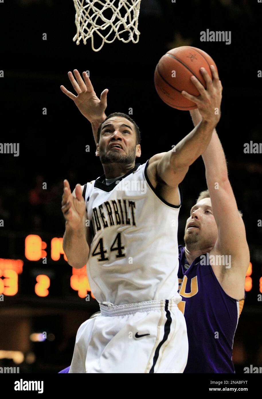 Vanderbilt forward Jeffery Taylor (44) shoots ahead of LSU center ...