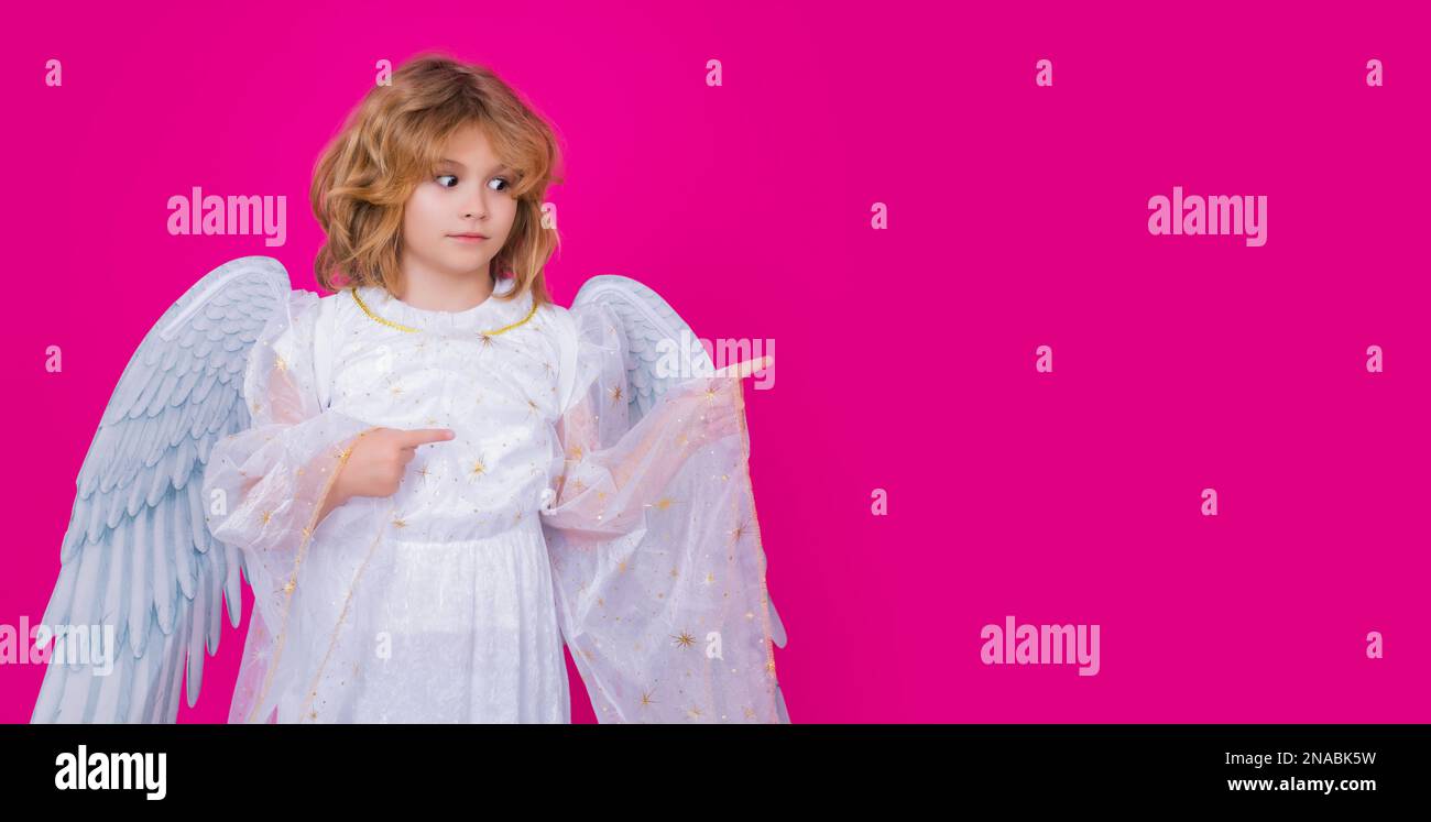 Child angel pointing finger, point gesture. Christmas kids. Little ...