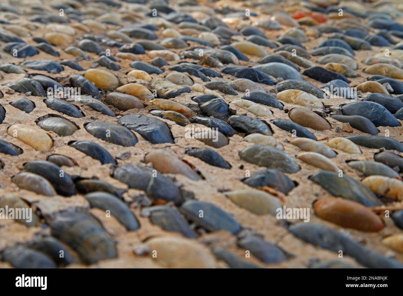 Circular symbol, cobblestone streets Stock Photo - Alamy