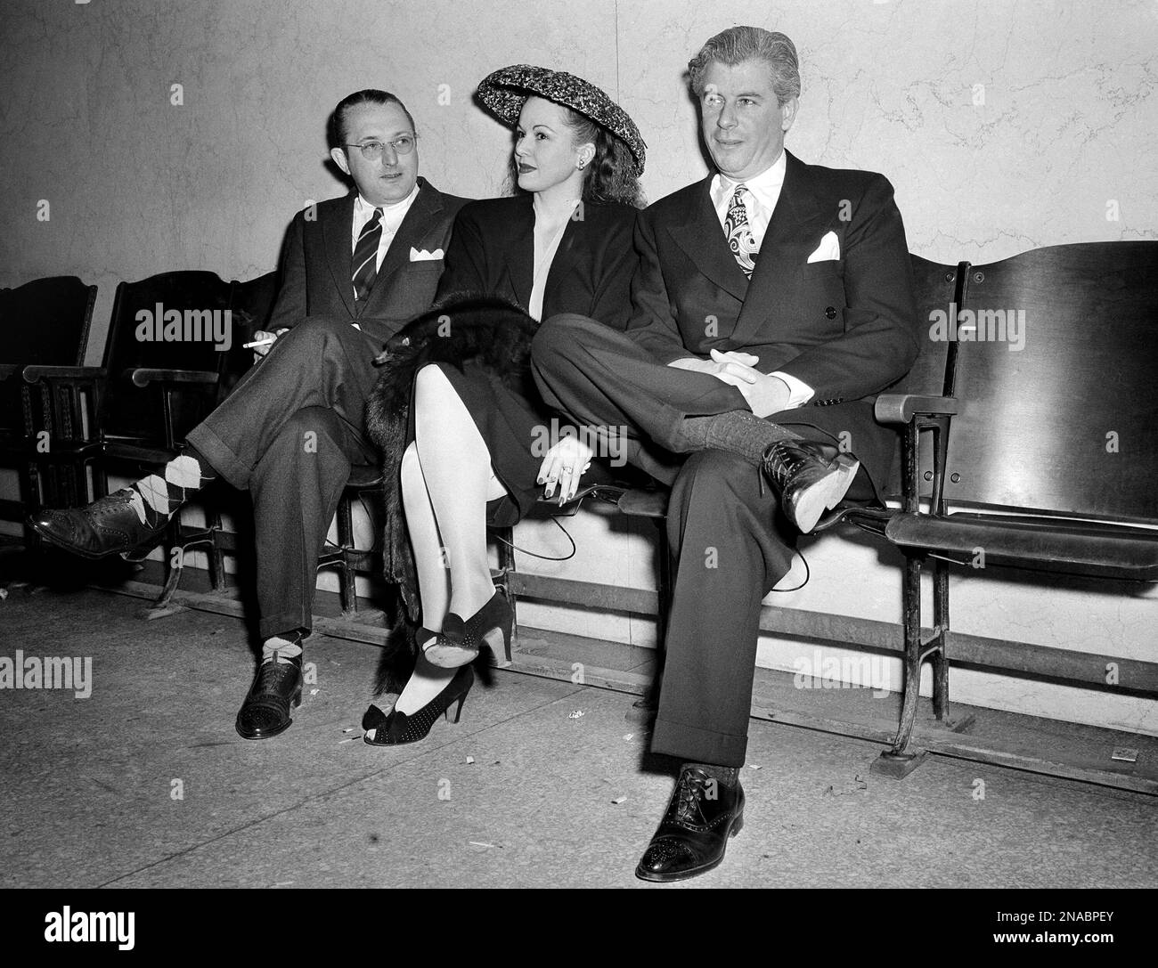 Bandleader Tommy Dorsey, left, sits with his wife, Pat Dane, center ...