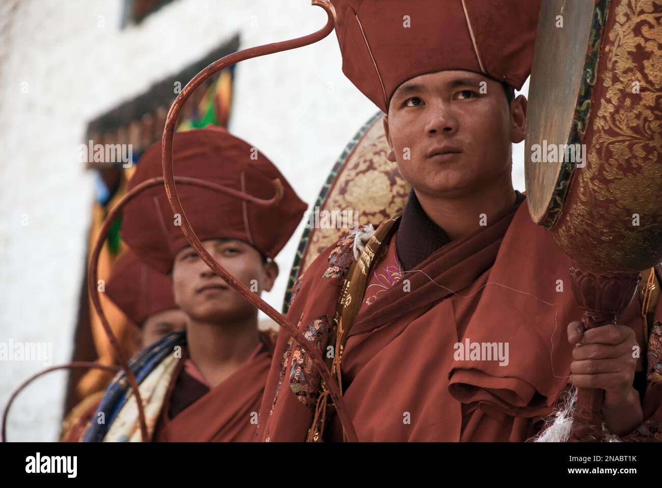 Performers in costume prepare before a Cham dance at the Bhutanese Paro ...