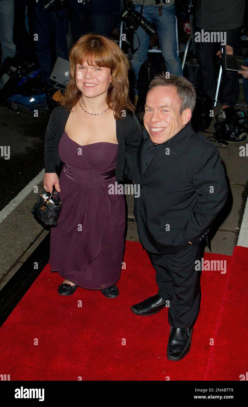 British actor Warwick Davis arrives with his wife Samantha Davis for ...