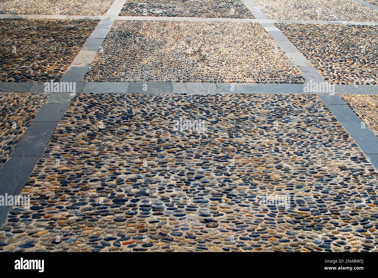 Circular symbol, cobblestone streets Stock Photo - Alamy