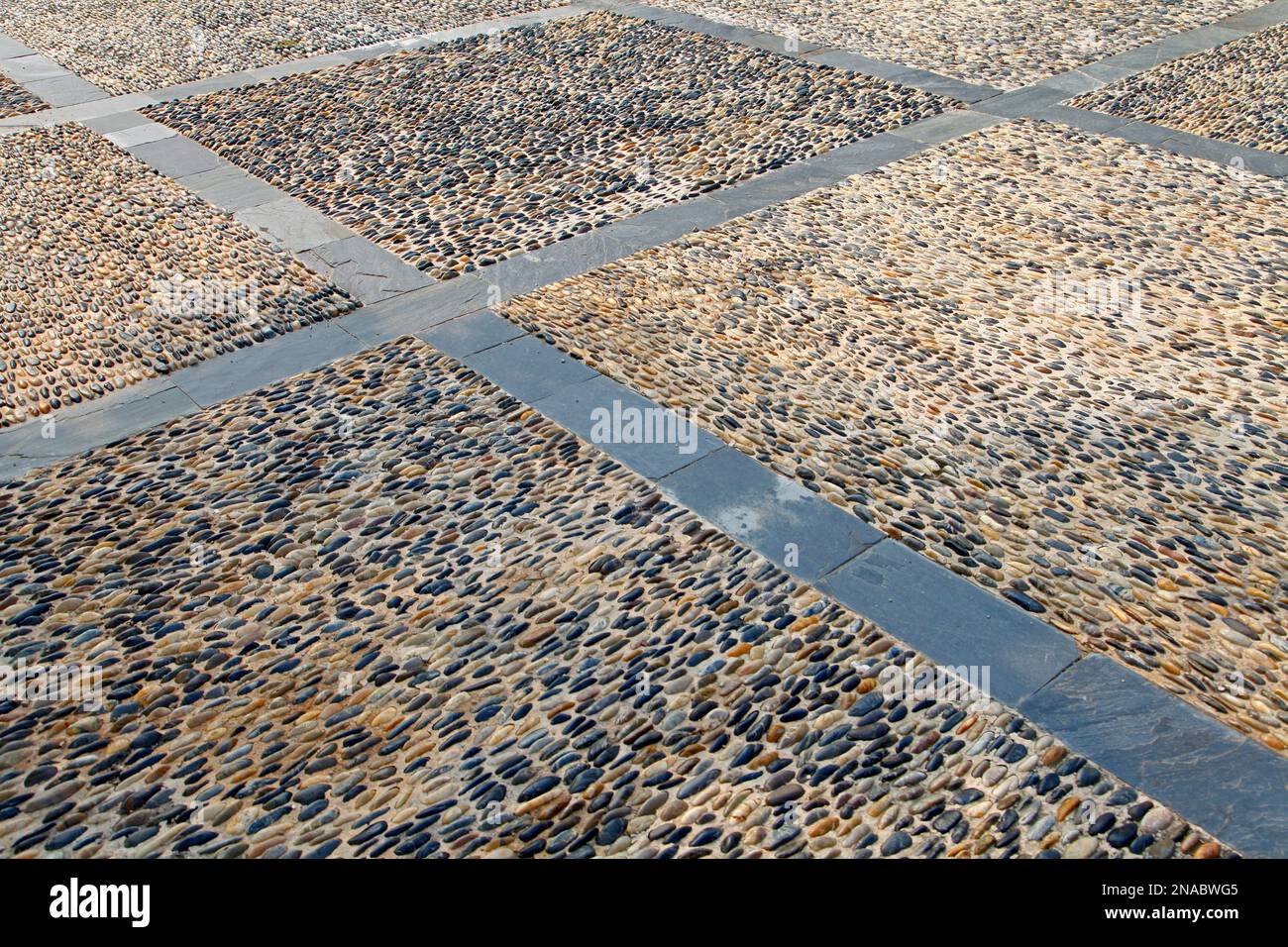 Circular symbol, cobblestone streets Stock Photo - Alamy