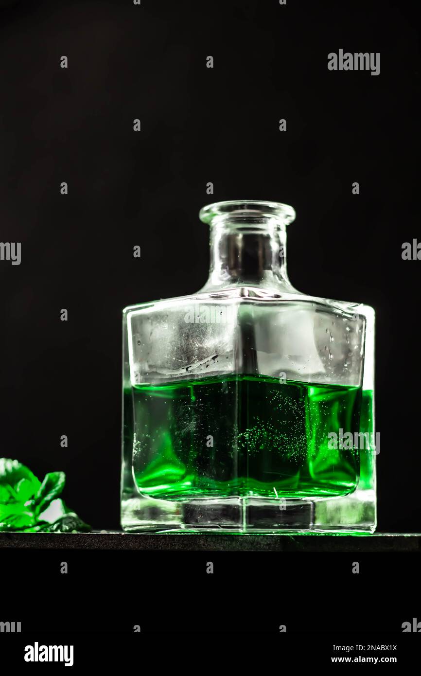 Stylized bottle of absinthe. Background, mockup Stock Photo - Alamy