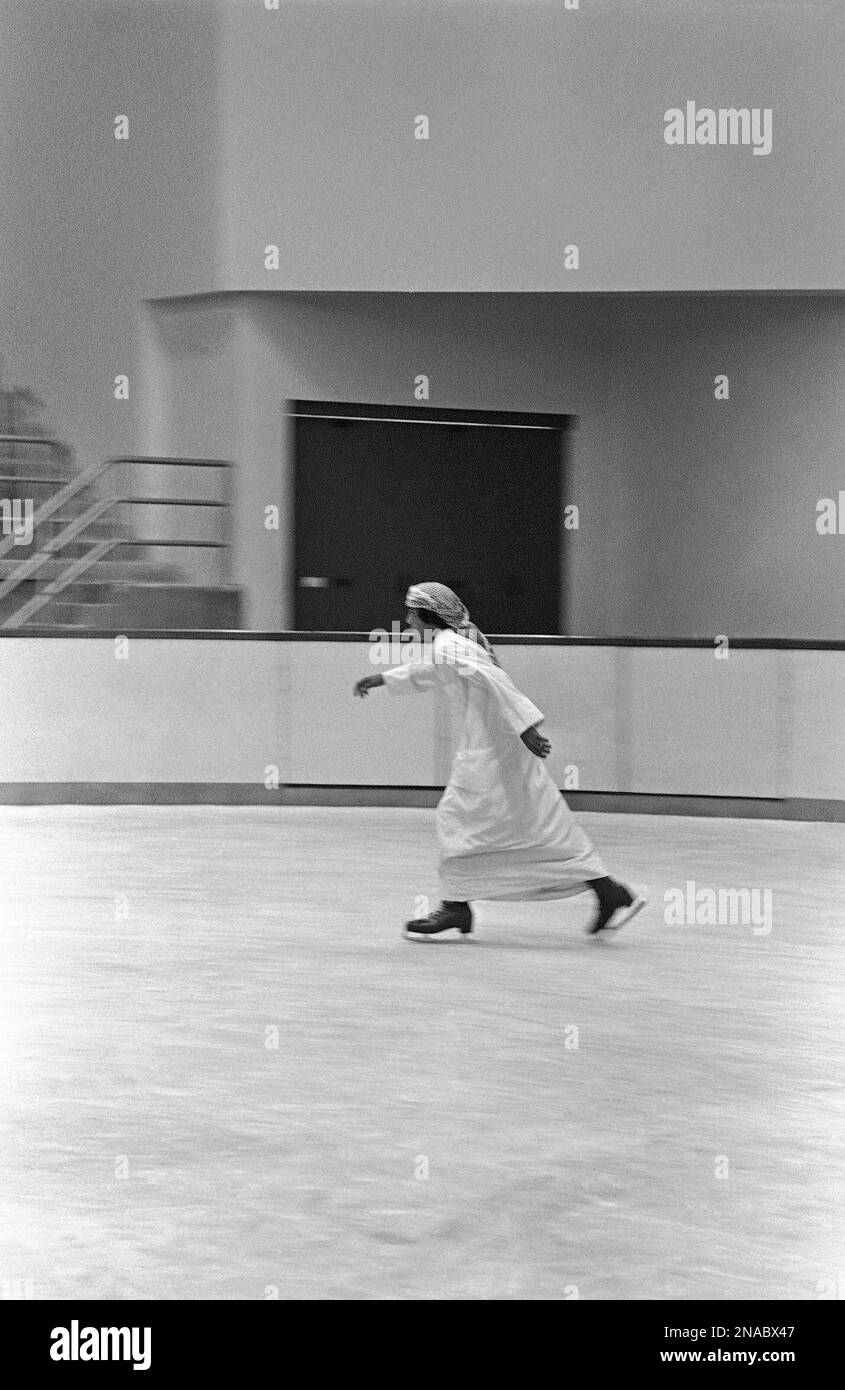 An Arab wearing traditional dish-dash on the ice at Leisureland's rink ...