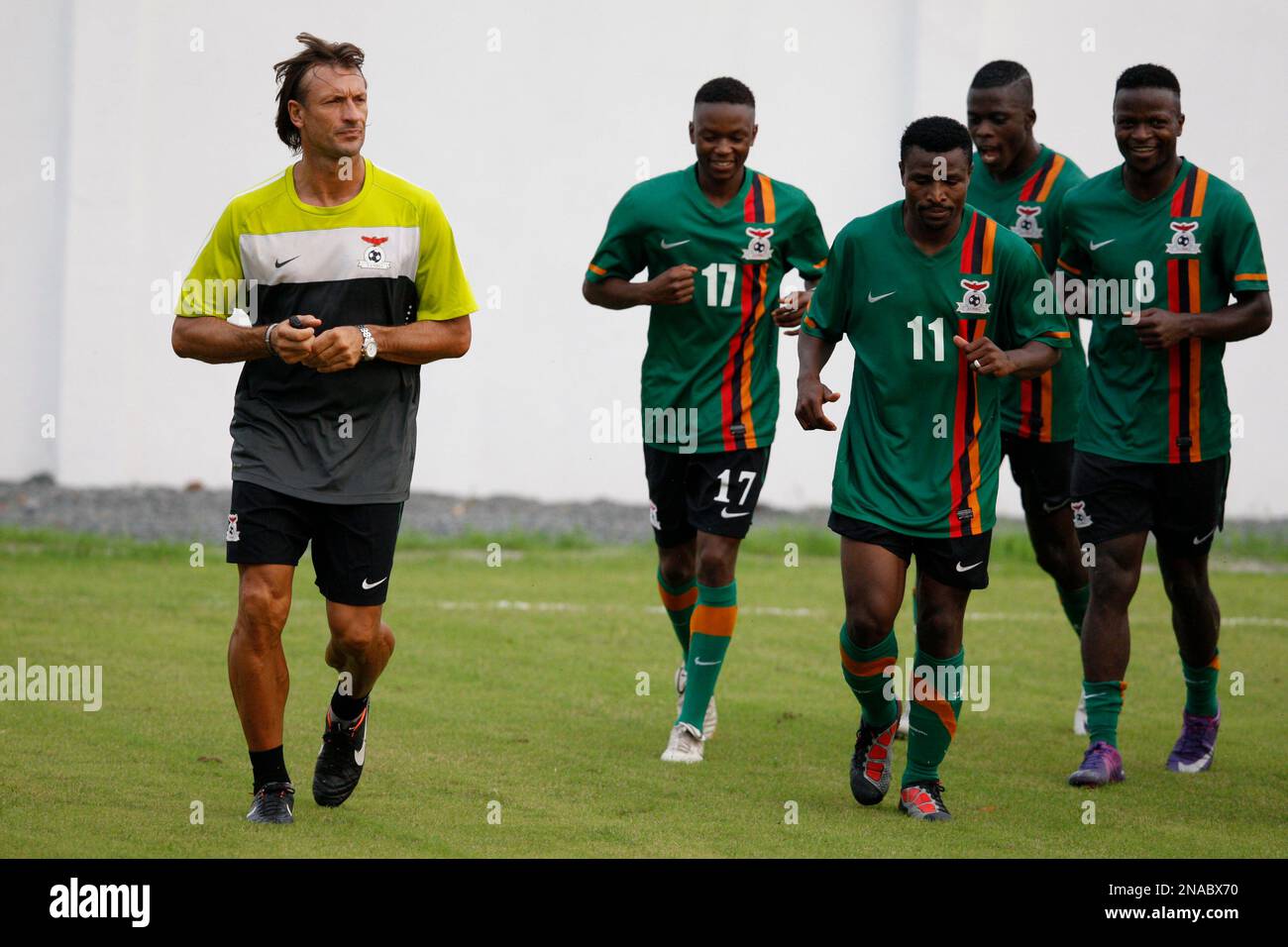 Zambia national team coach coach Herve Renard, left, jogs with players ...