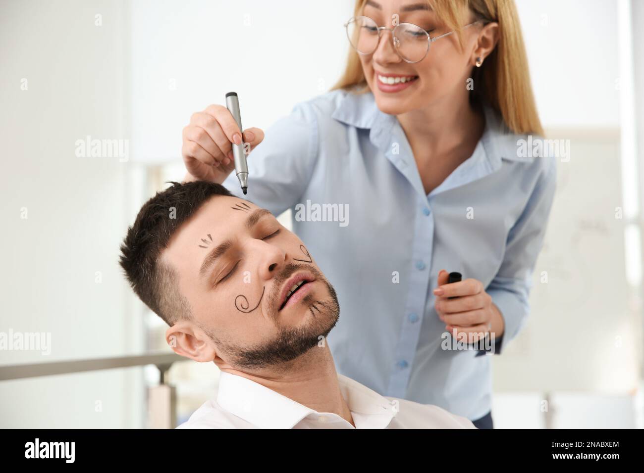 Drawing on sleeping face prank hi-res stock photography and images - Alamy