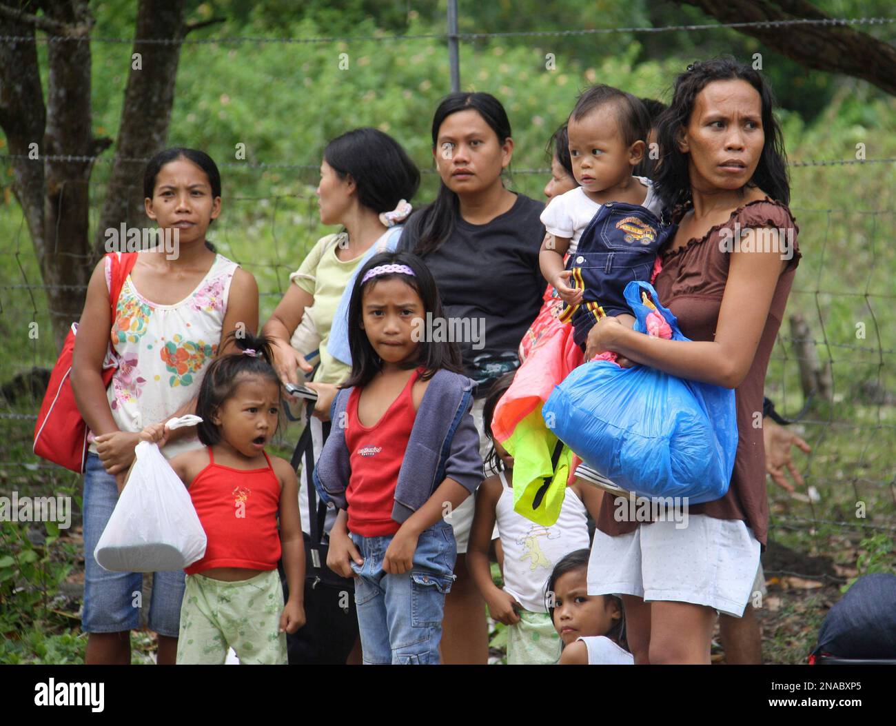 Residents stay in open areas with few belongings following a magnitude ...