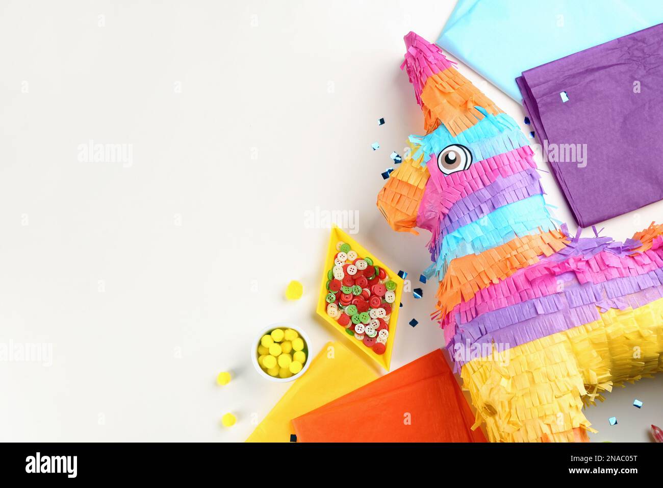 Flat lay composition with cardboard donkey and materials on white ...