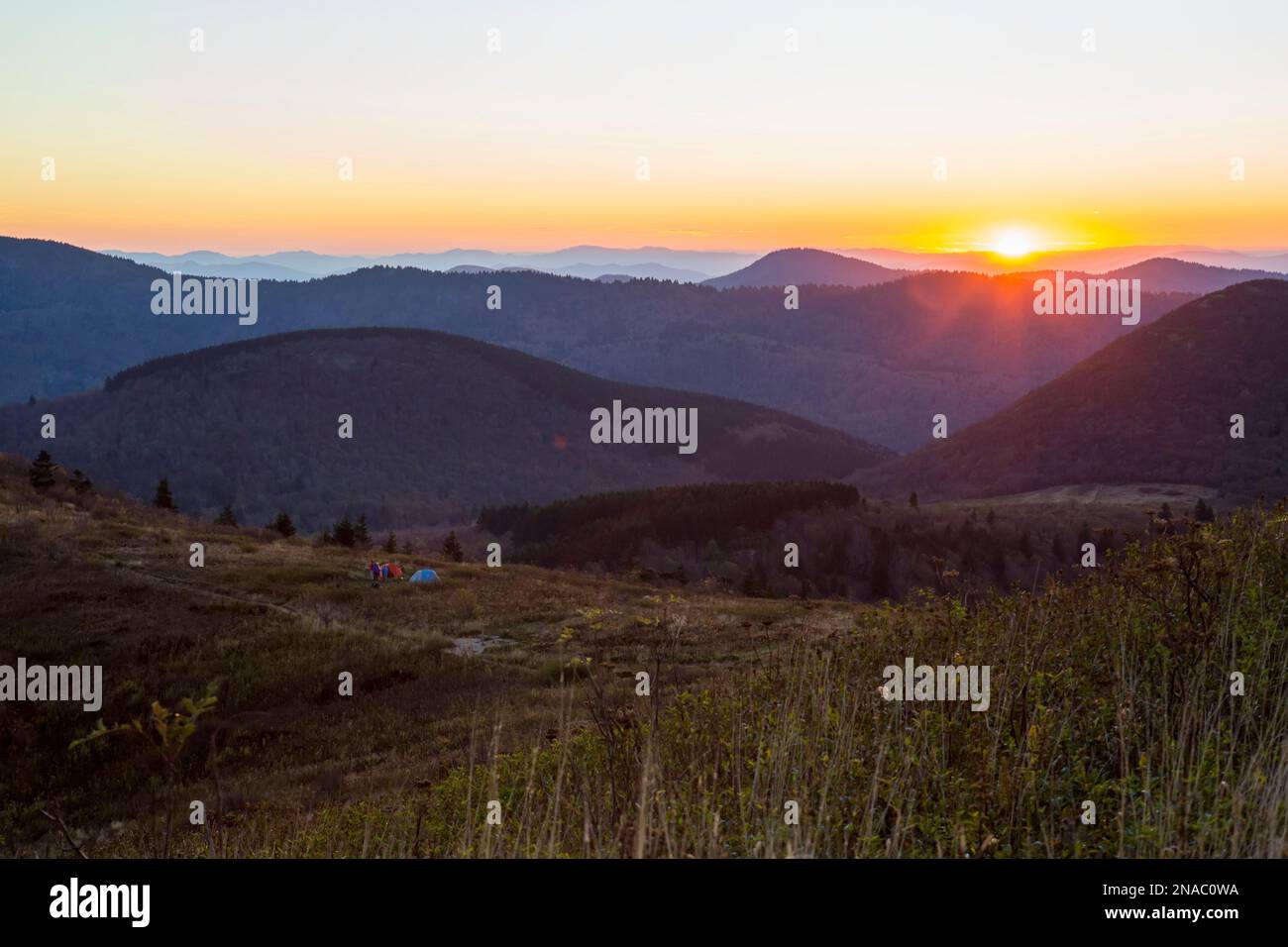 At Black Balsam Knob in the Blue Ridge Mountains, several people camp ...