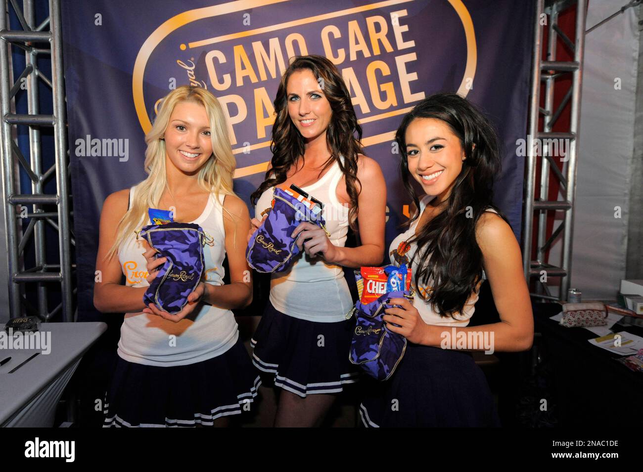 The Crown Royal girls are seen at the Crown Royal Heroes Tailgate Party ...