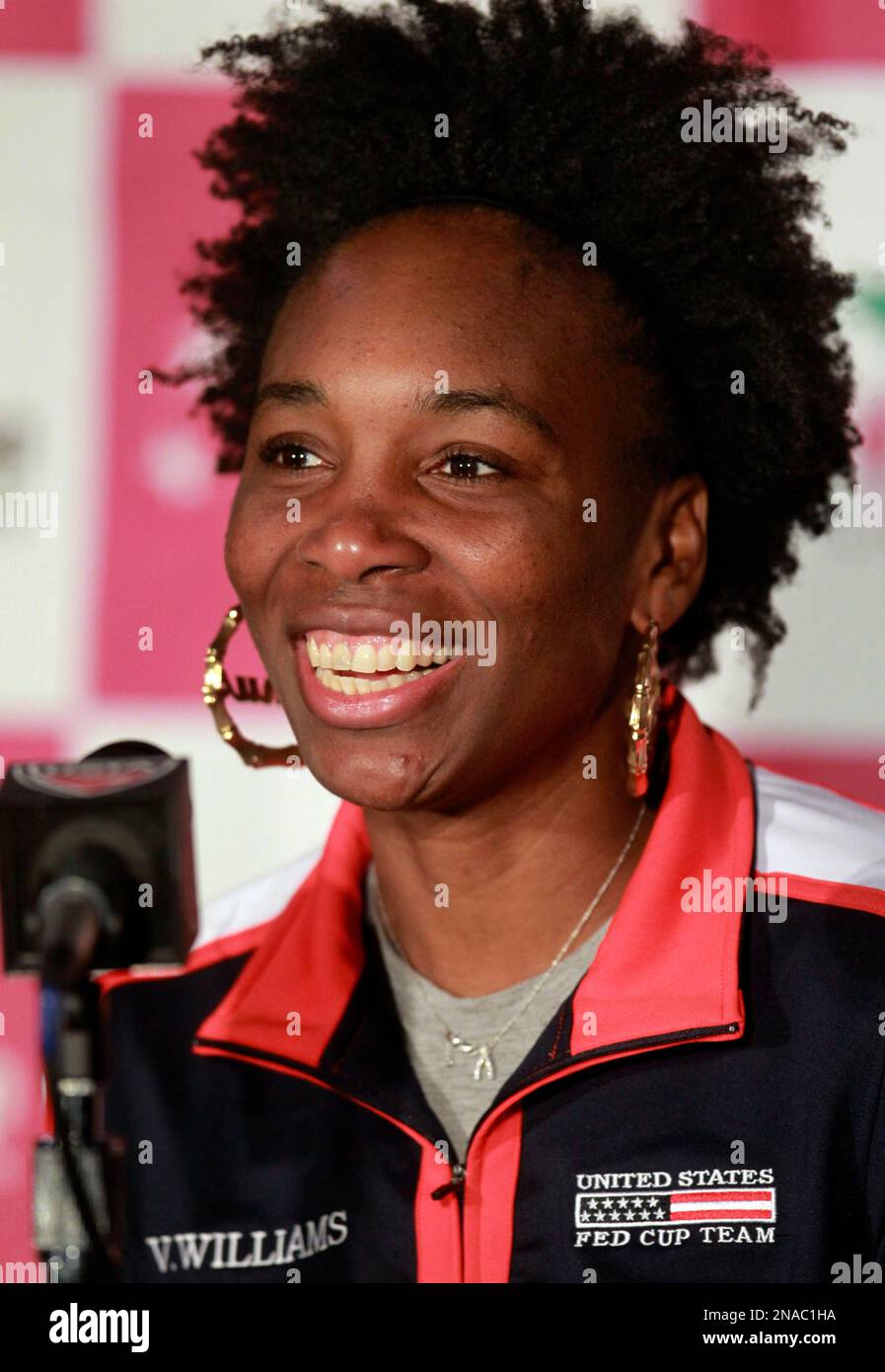 Venus Williams faces reporters after she and teammate Liezel Huber ...
