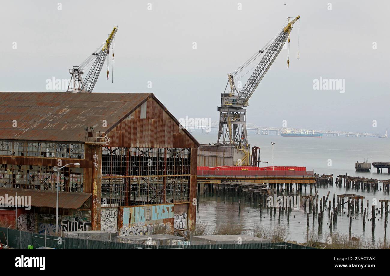 This Tuesday, Jan. 31, 2012 photo shows old buildings, cranes and the ...