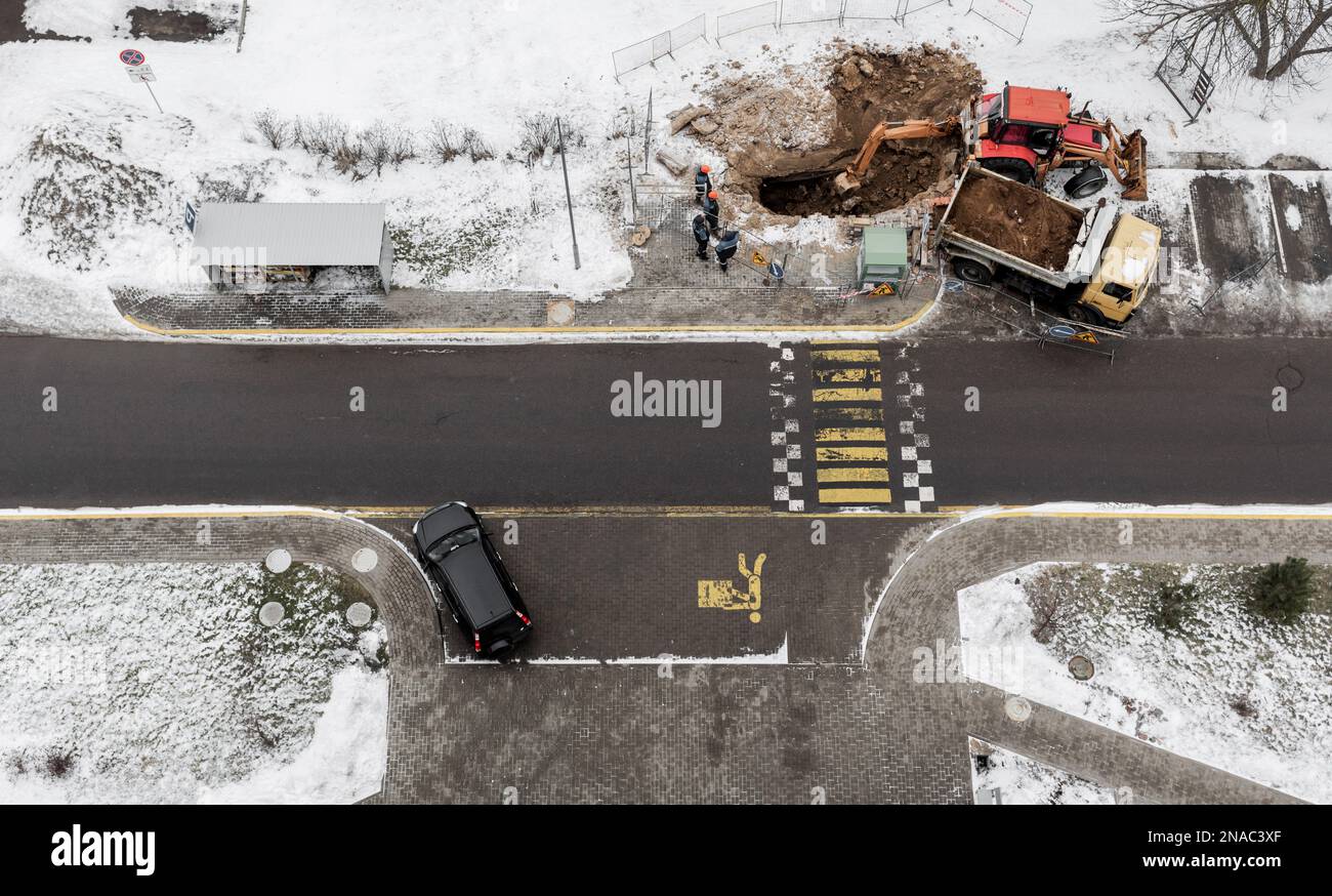 Group of construction workers on construction site. Heavy construction ...