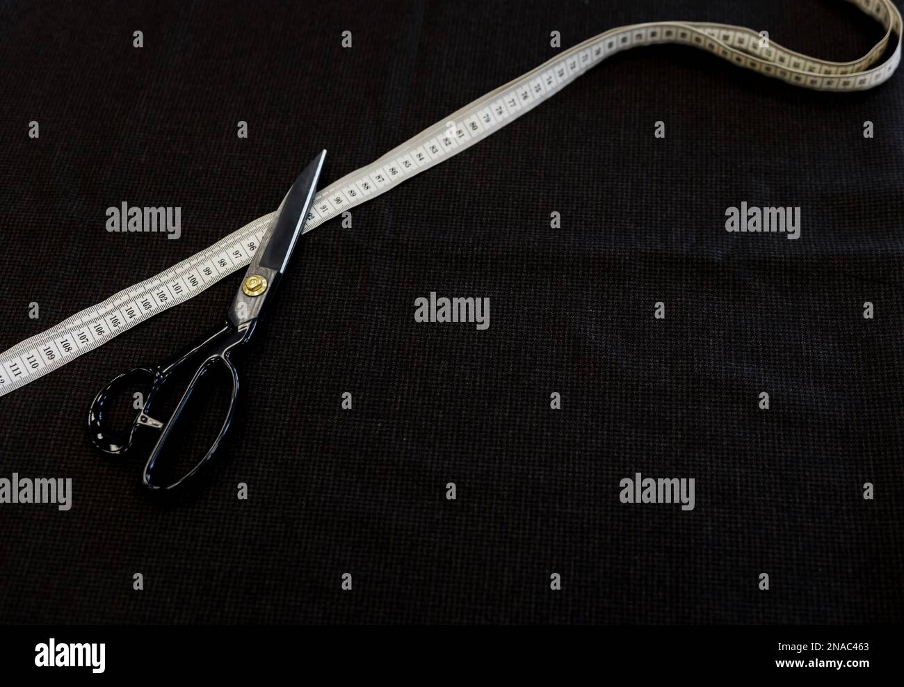 Tailor scissors tape measure suit hi-res stock photography and images ...